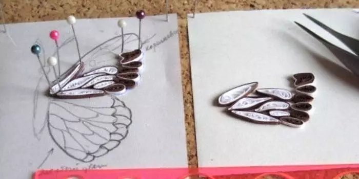 Quilling una farfalla secondo lo schema