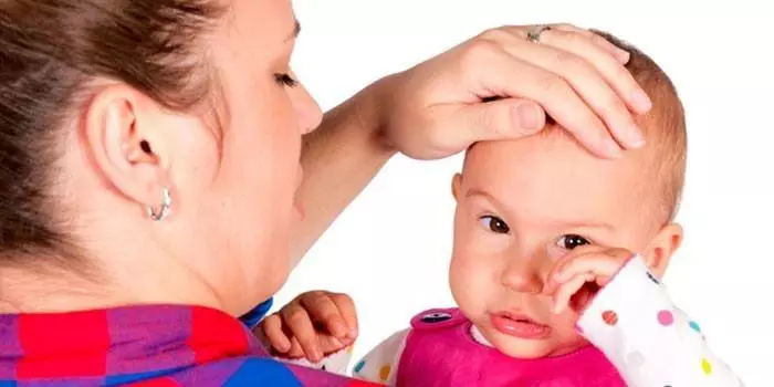 Woman and breastfeeding child