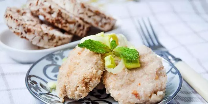 Steamed fish cakes on a plate