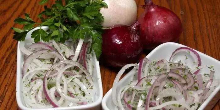 Red onion marinated in vinegar with herbs