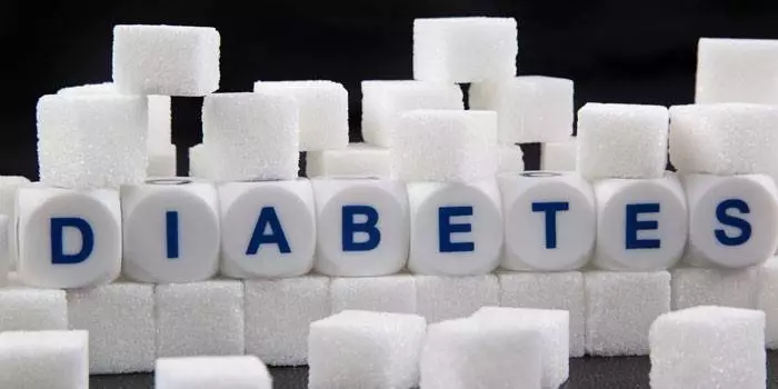 Raffinerat socker och inskriptionen Diabetes