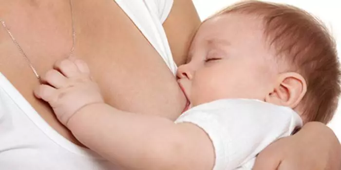 Woman breastfeeding her baby