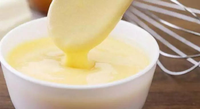 Custard and spoon