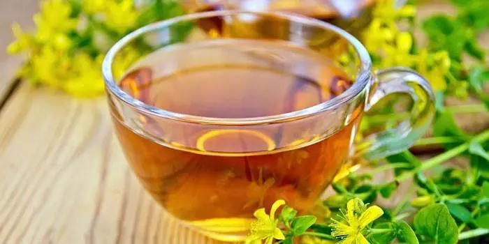 St. John's wort decoction in a cup