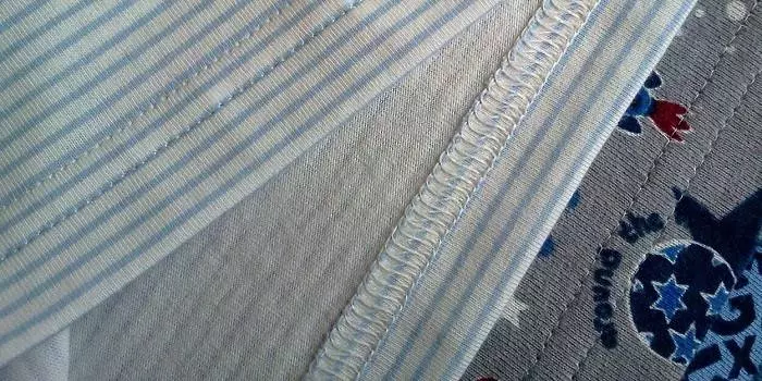 Cover stitch on the garment