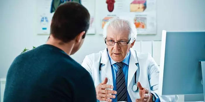 The doctor consults the patient