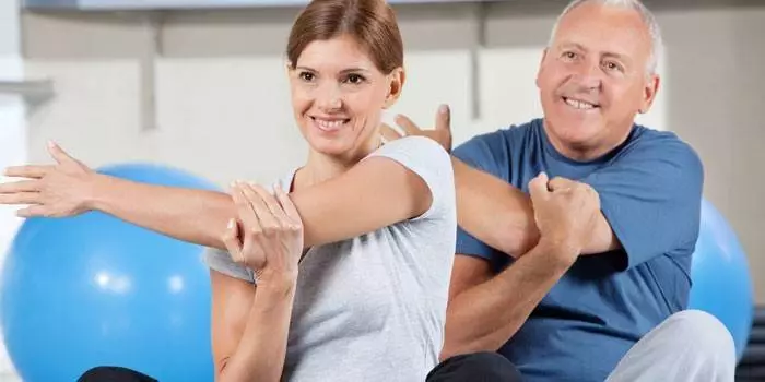 People are engaged in physiotherapy exercises